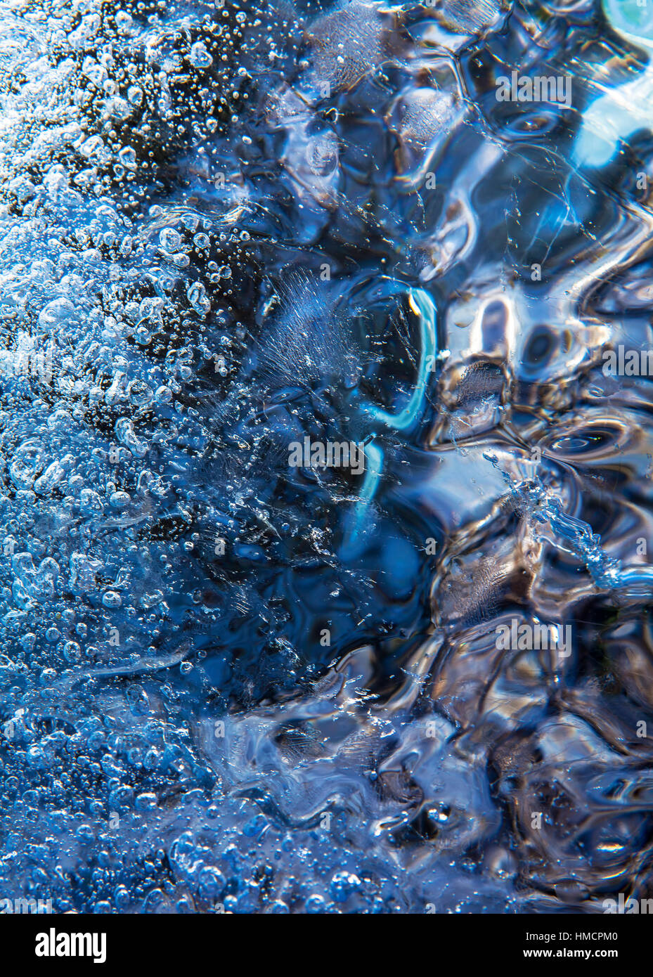 Patterns and bubbles in sea ice on an Alaskan beach Stock Photo - Alamy