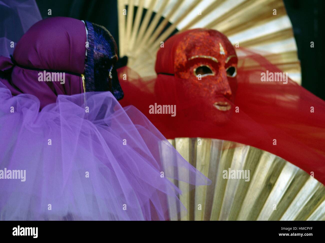 People in costumes with fans at Venice carnival, Veneto, Italy Stock ...