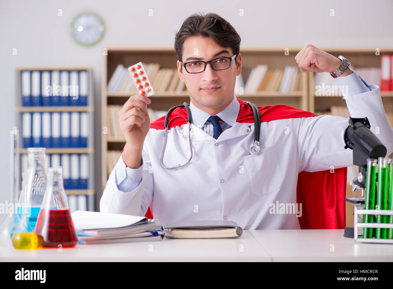 Superhero doctor working in the lab hospital Stock Photo - Alamy