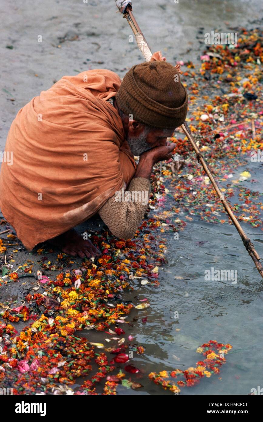 Sadhu, Hindu ascetic, holding a stick, Varanasi, Uttar Pradesh, India ...