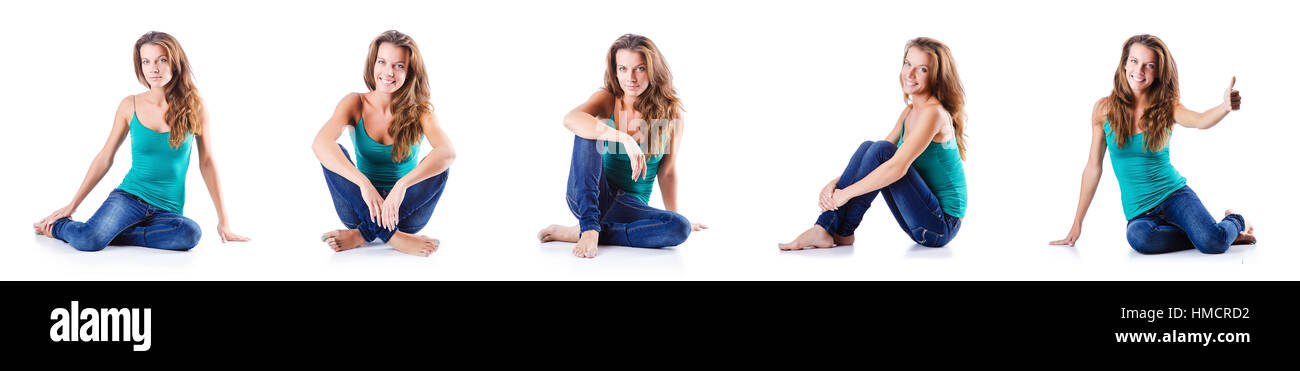 Happy student sitting on the floor Stock Photo - Alamy