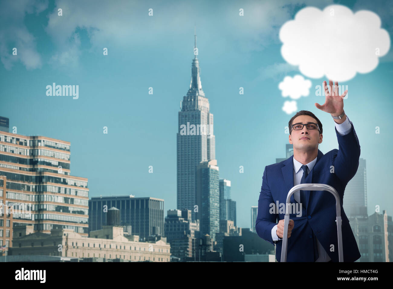 Businessman reaching out to callout message Stock Photo - Alamy
