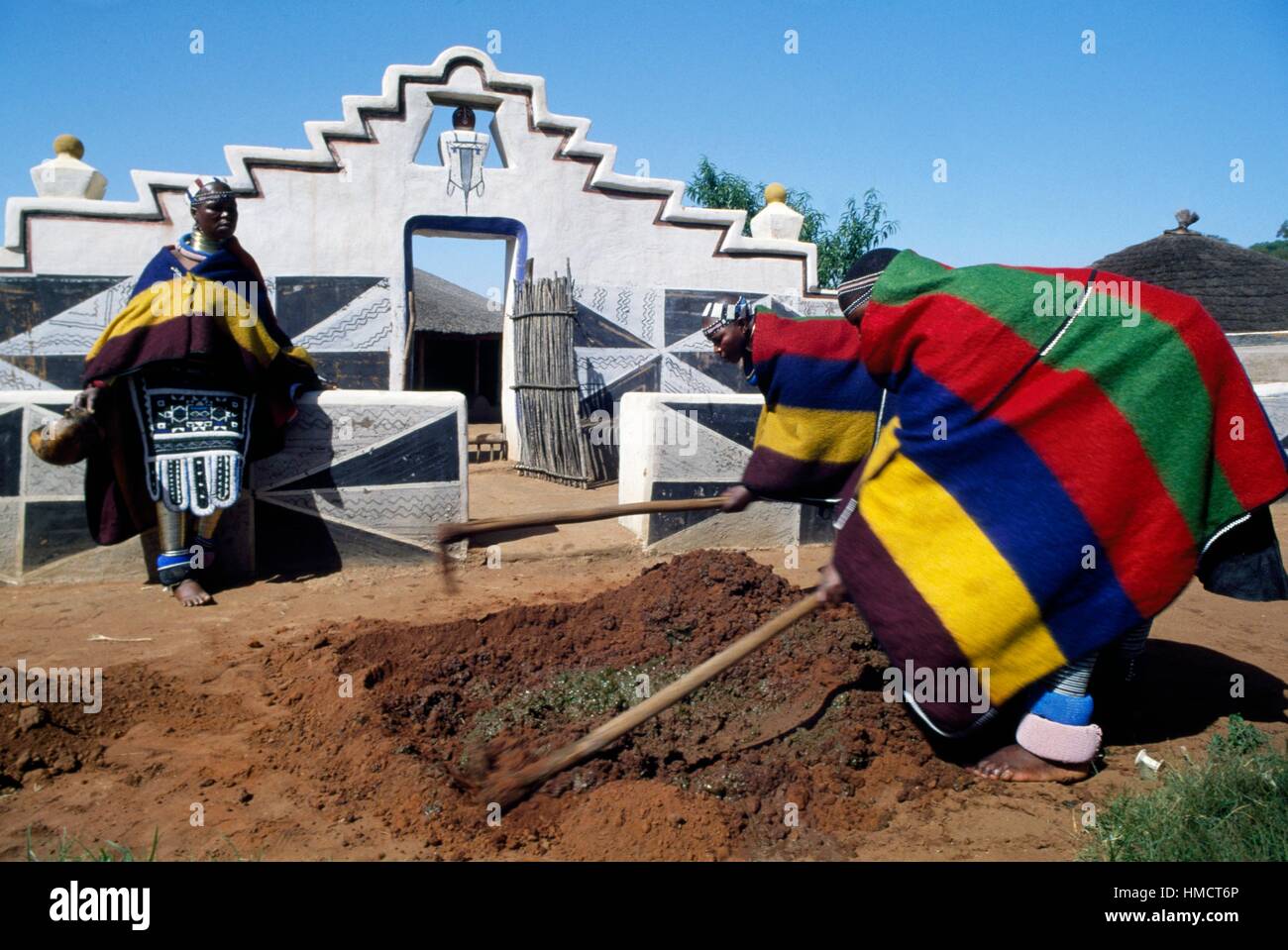 Men mixing clay in a Ndebele village, South Africa Stock Photo - Alamy
