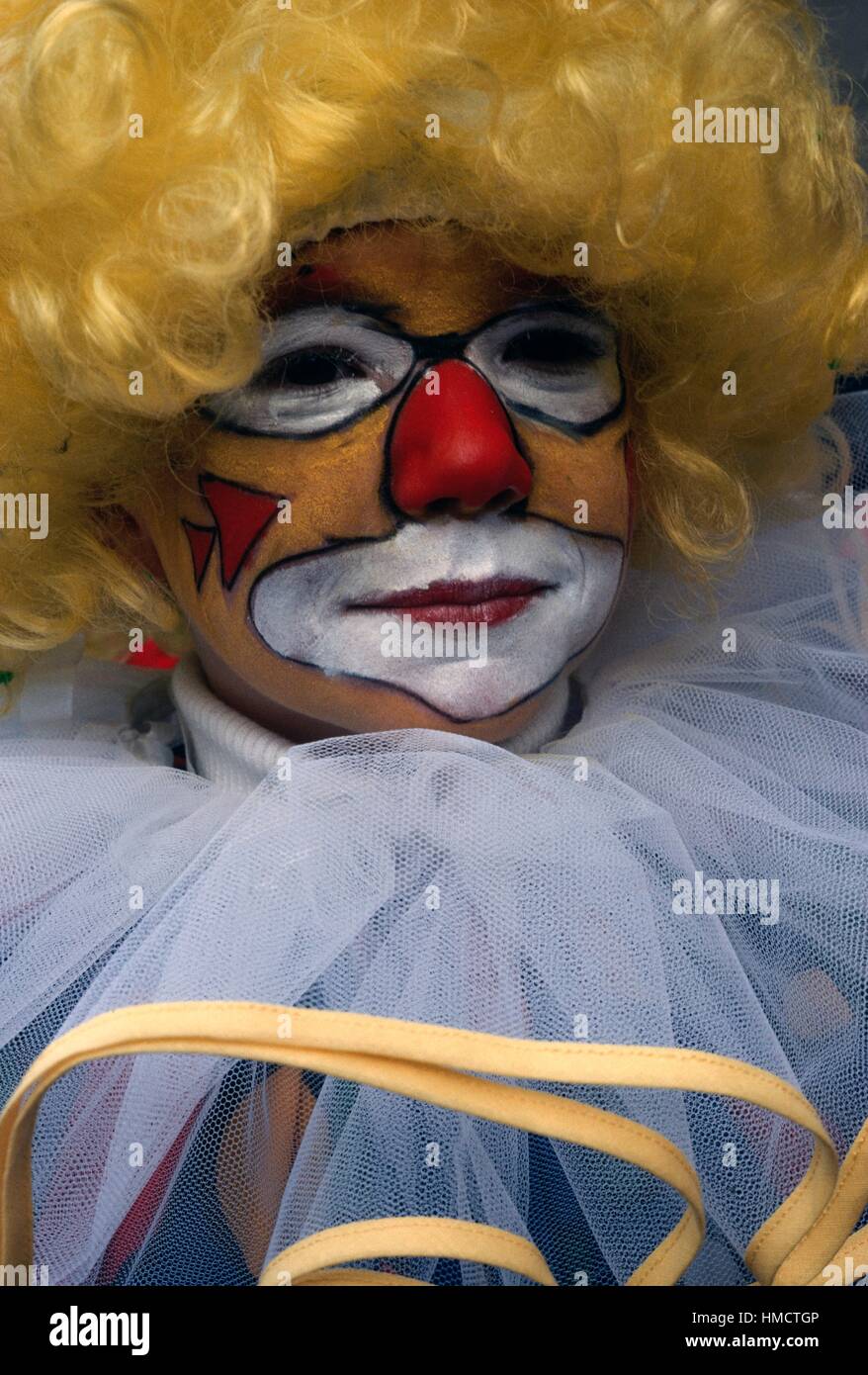 Child with painted face dressed as a clown, Carnival of Binche (UNESCO ...