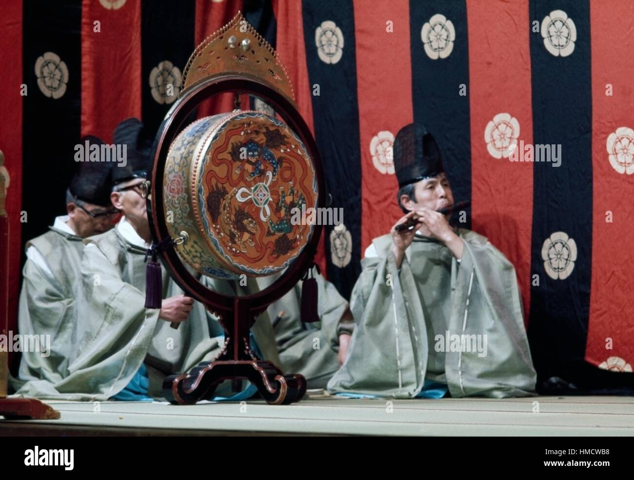 Men wearing traditional clothes palying musical instruments, Japan ...