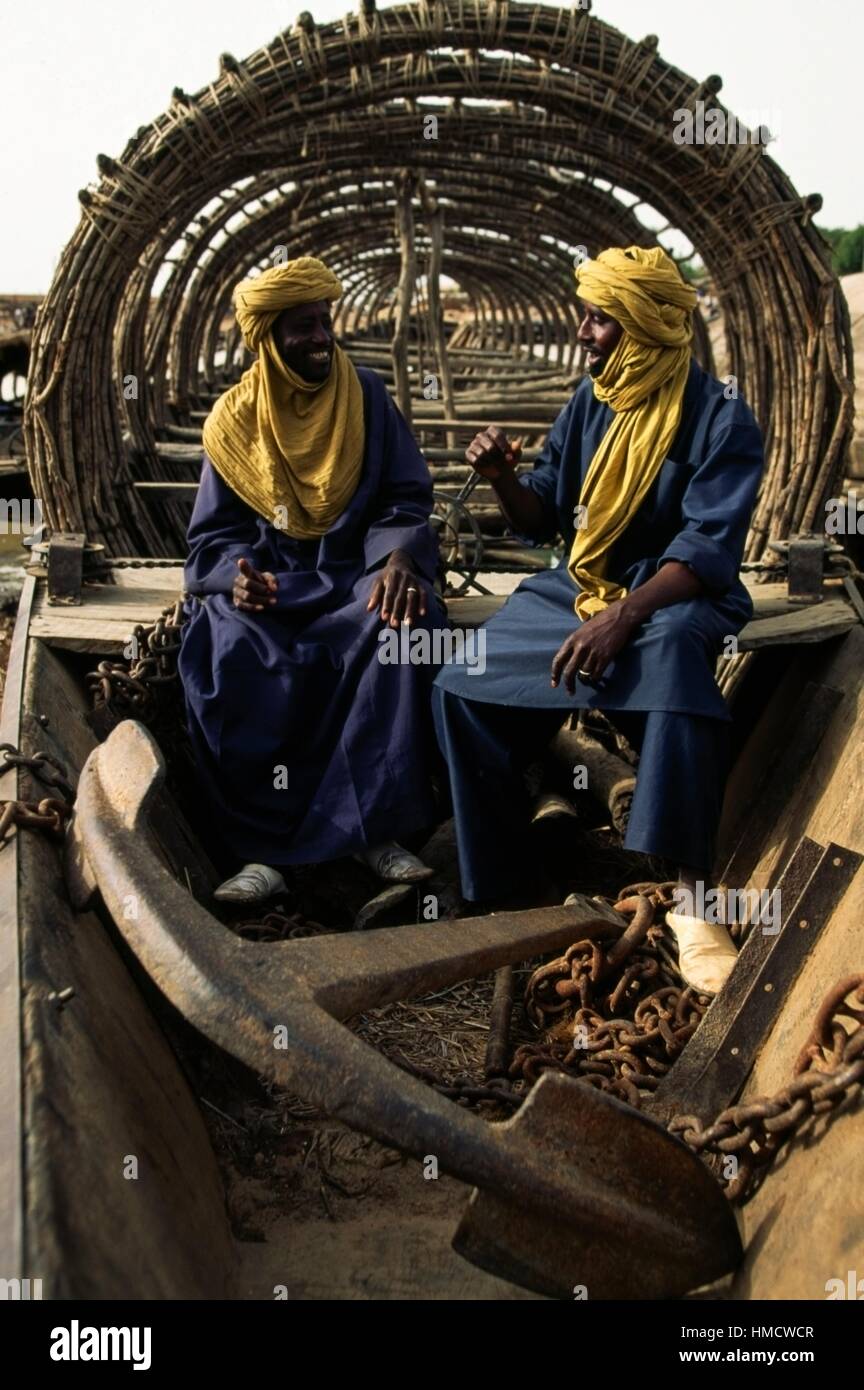 Two men in a pinasse (type of pirogue), Mopti, Mali Stock Photo - Alamy
