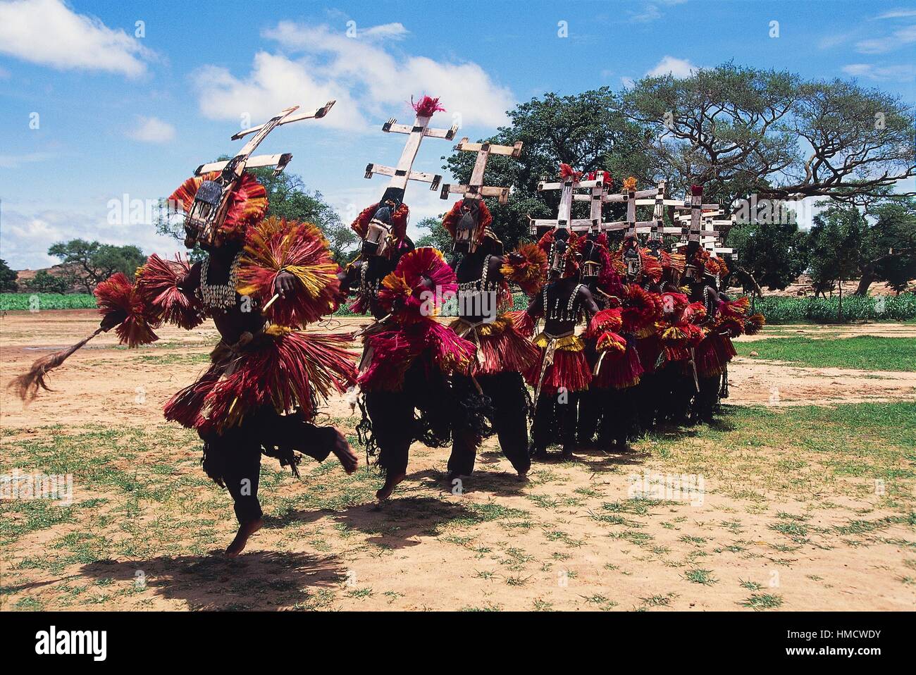 Dogon dancers wearing Kanaga masks performing the Dama or masked ...