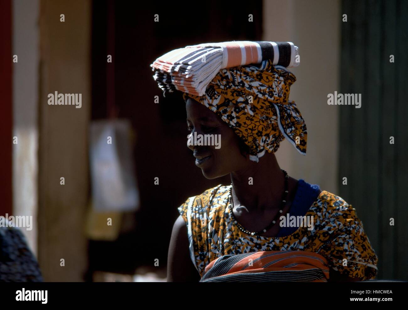 Woman wearing multi-coloured traditional costumes, Senegal Stock Photo ...