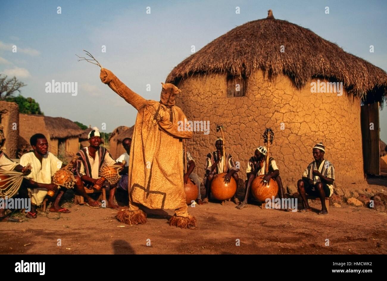 Men performing the panther dance, and men playing musical instruments ...