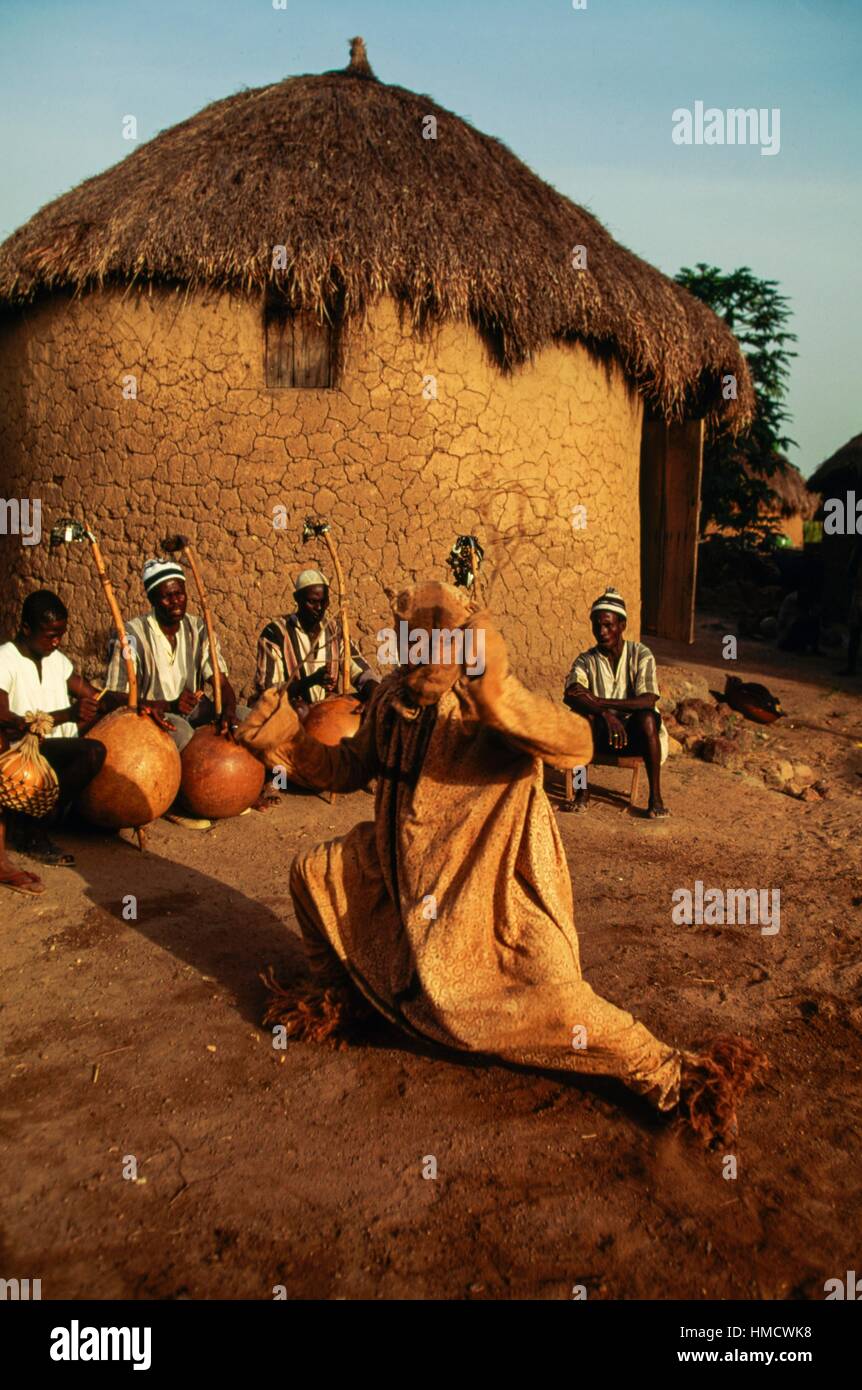 Men performing the panther dance, and men playing musical instruments ...