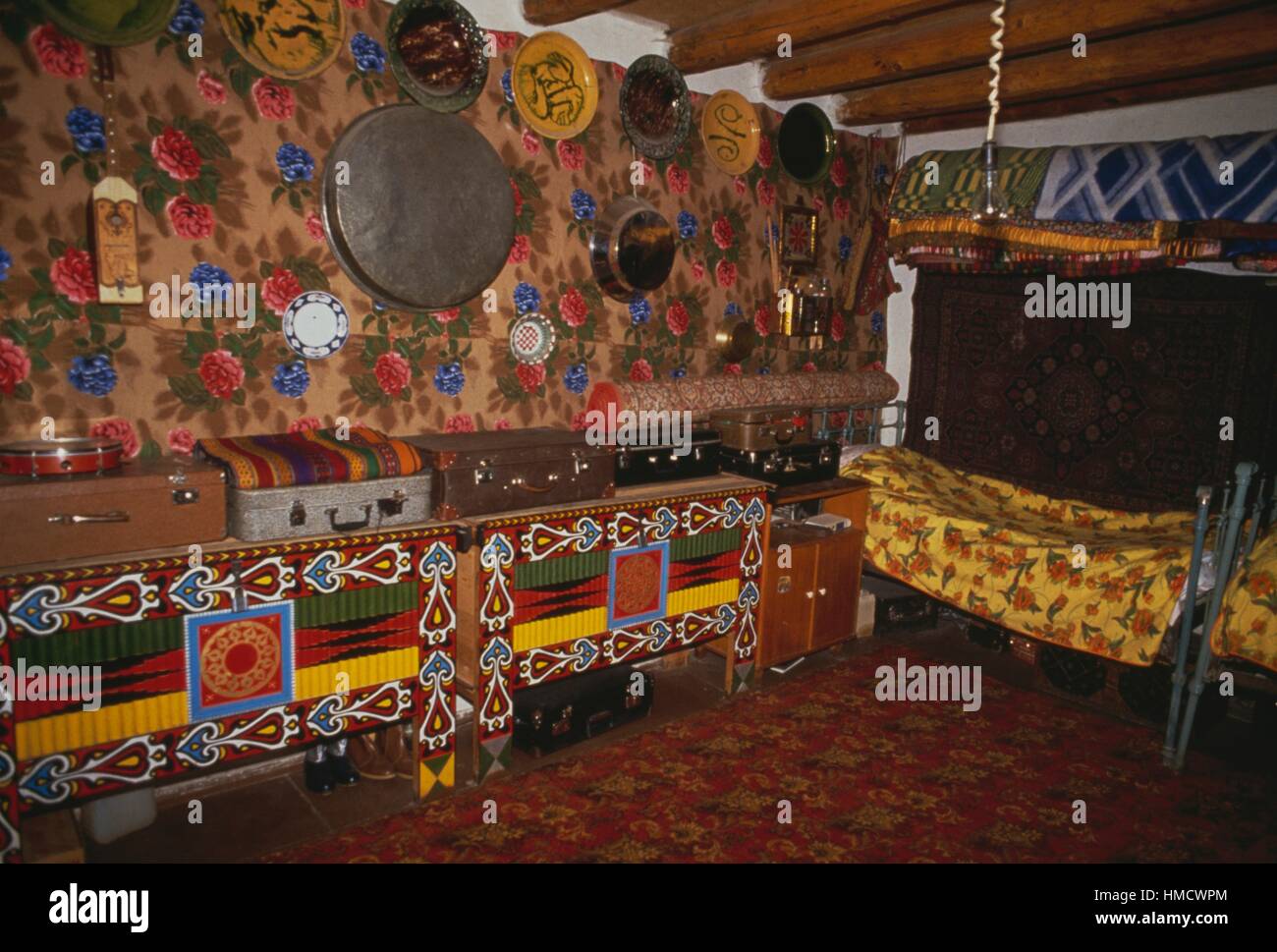 House interior with decorated furniture, Caucasus, Dagestan, Russia ...