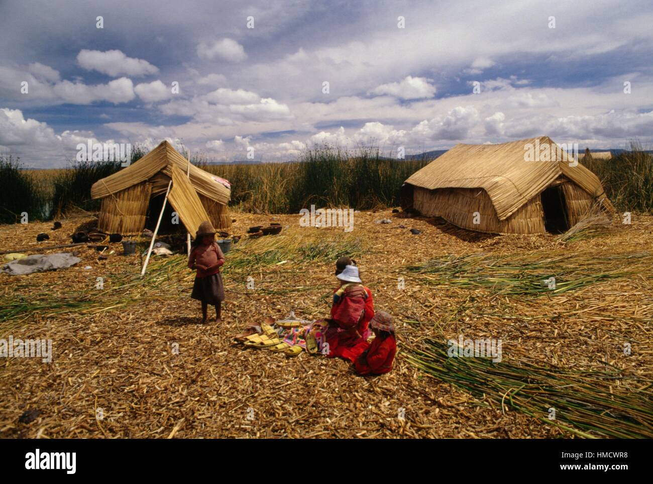 Village with thatched houses, Uros islands, Lake Titicaca, Peru Stock ...
