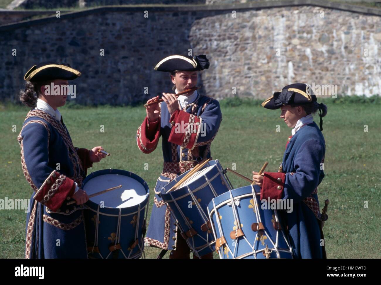 Drummers and flautists wearing the uniform of the French Colonial ...