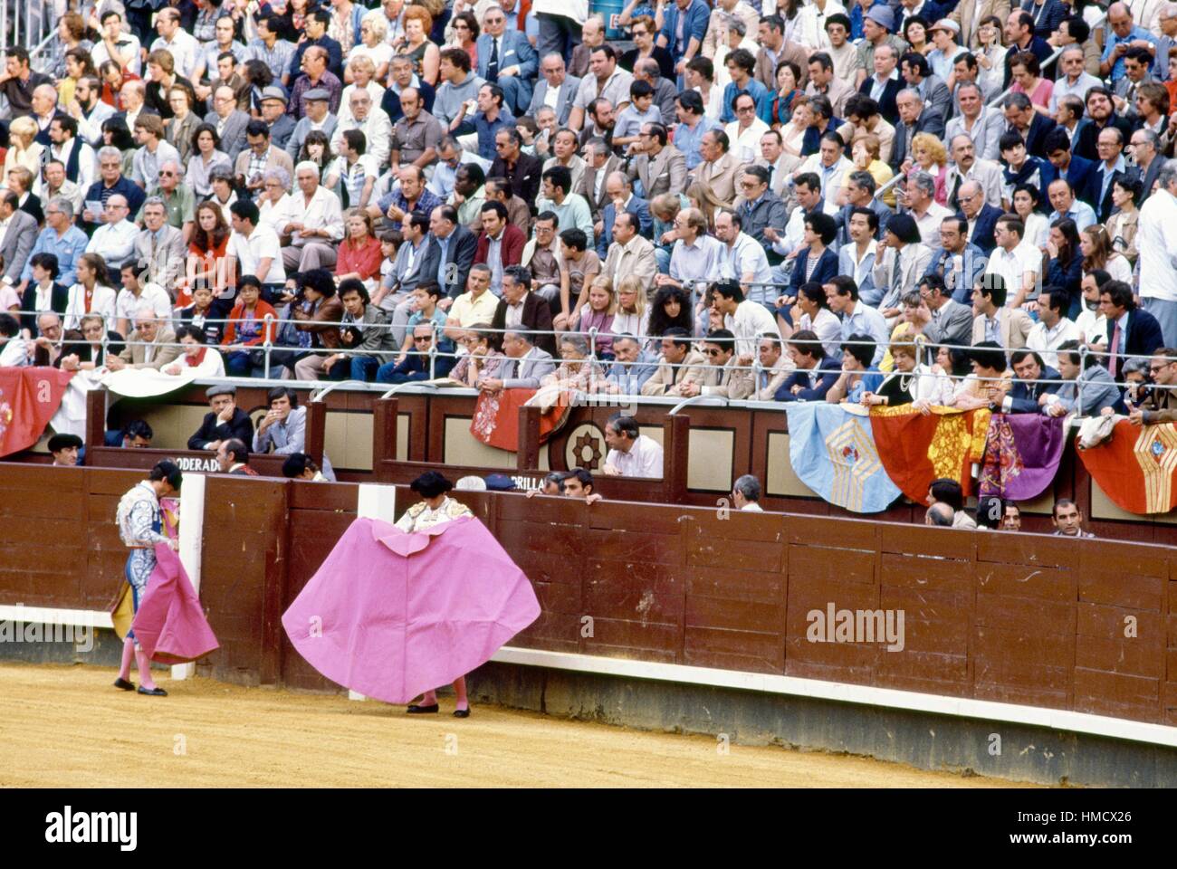 Bullfighters with the capote (capes) in front of the spectators ...