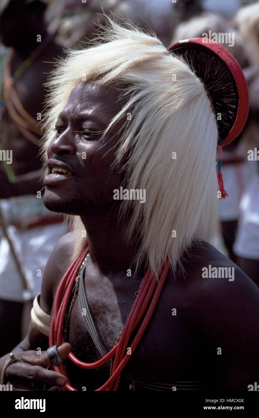 Dancer wearing traditional headgear during the harvest festival, Togo ...