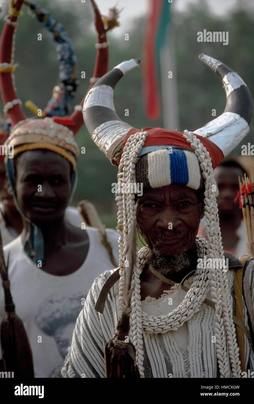 Men wearing traditional costumes and horned-headdresses, Togo Stock ...