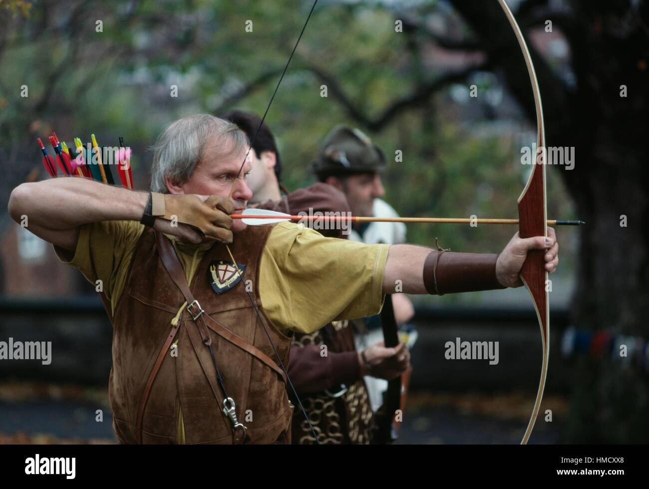 Archer with bow during historical reenactment of a Medieval Fair ...