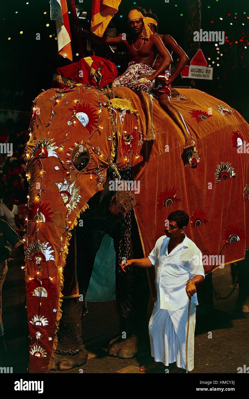 Men on elephant with trappings, Esala Perahera festival, Kandy, Sri ...