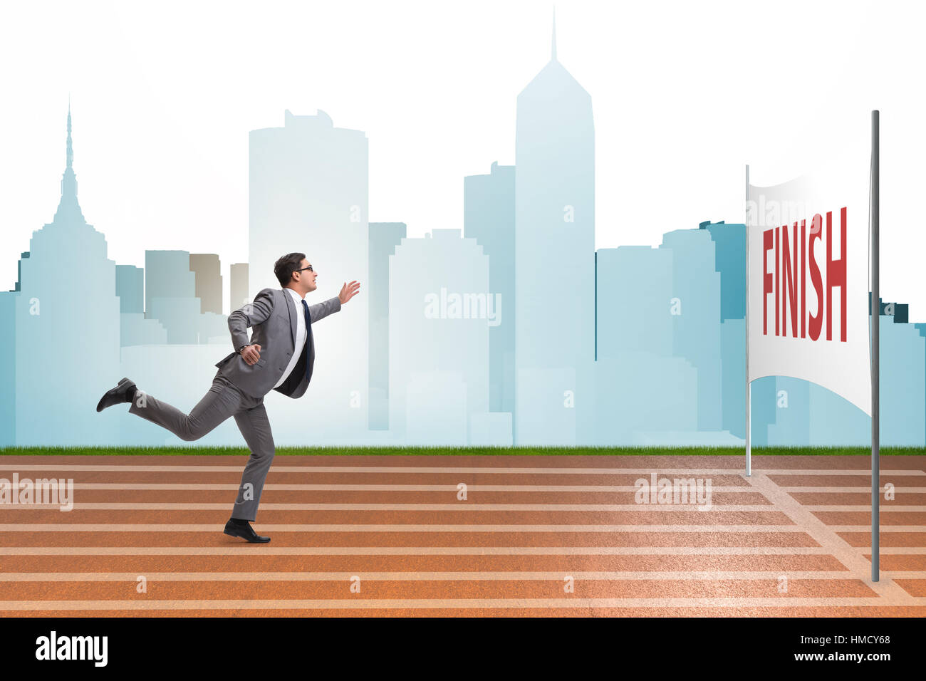 Businessman on the finishing line in competition concept Stock Photo ...