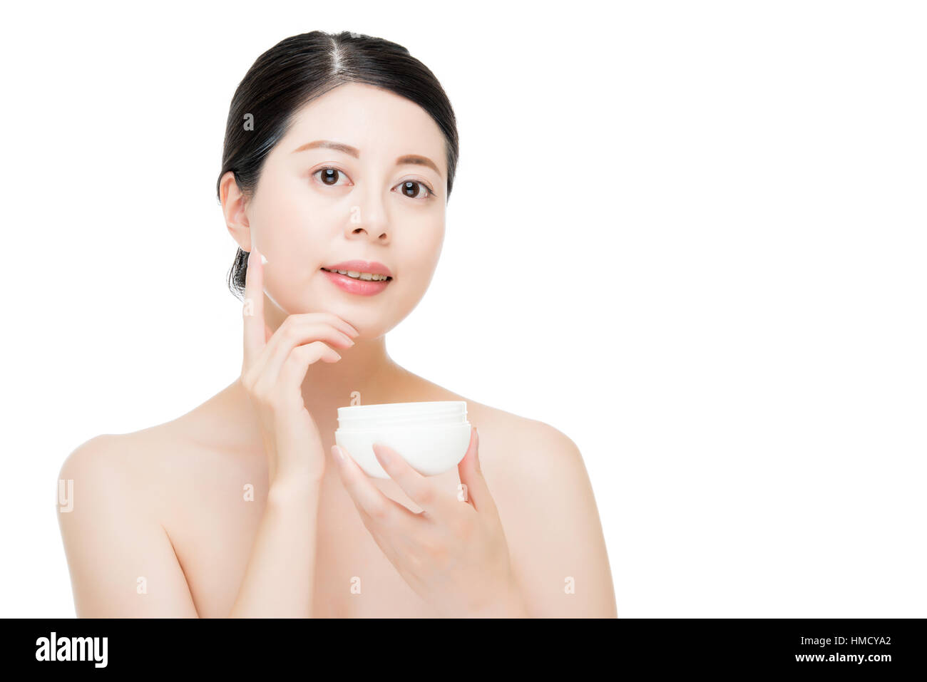 asian beauty woman use hand applying faciel product. isolated on white ...