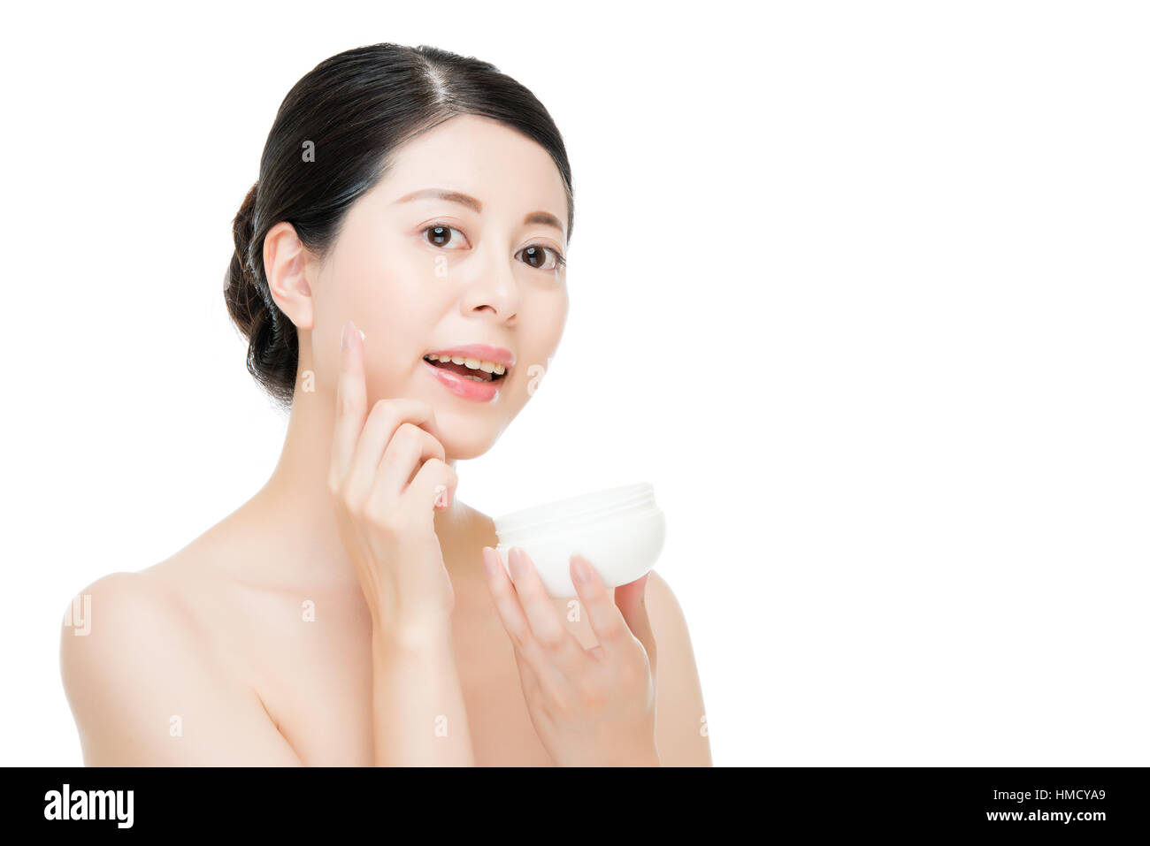 asian beauty woman use hand applying faciel product. isolated on white ...