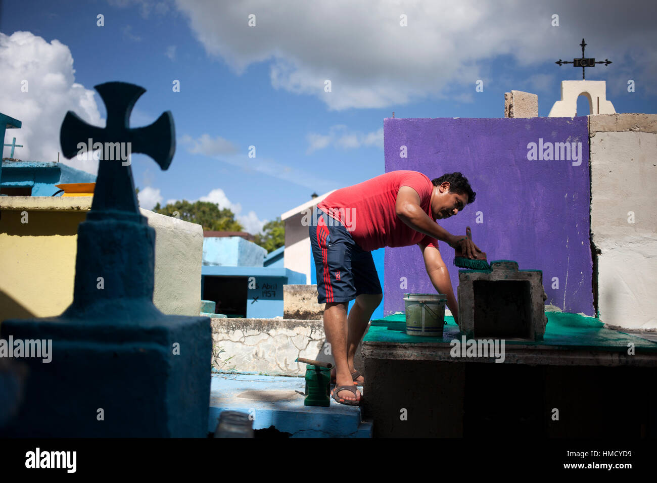 People clean the tomb of their deceased family members in the Mayan ...
