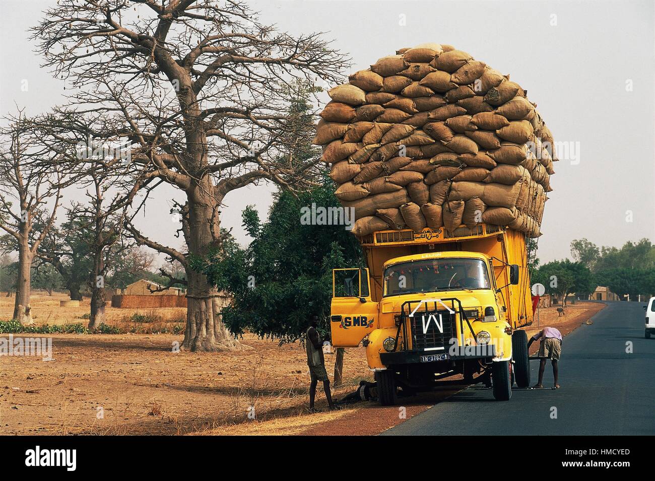 Truck loaded with sacks of millet, Fatick, Senegal Stock Photo - Alamy