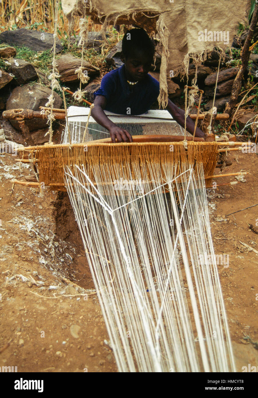 Girl working on a loom hi-res stock photography and images - Alamy