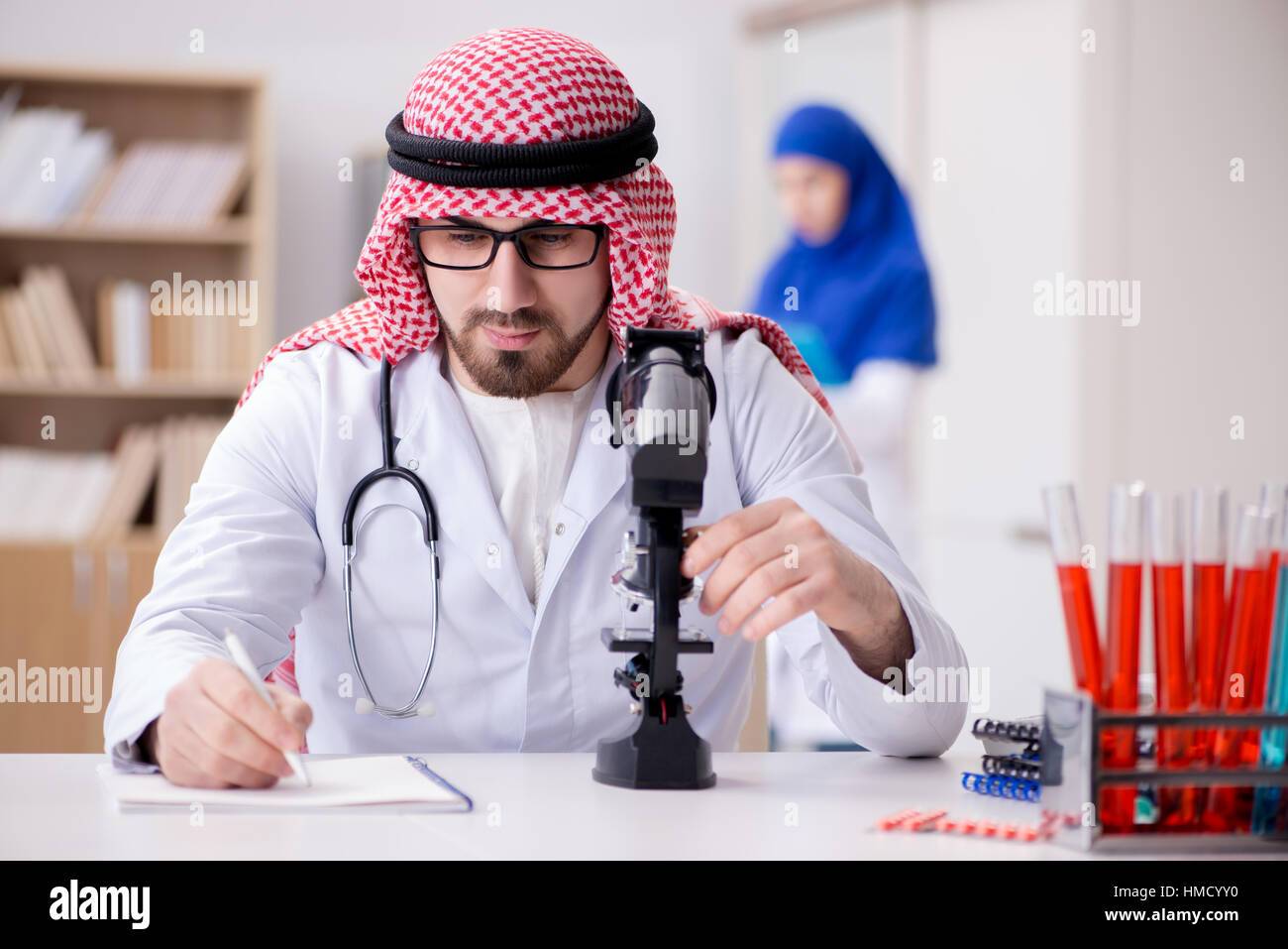Arab doctor working in the lab hospital Stock Photo - Alamy