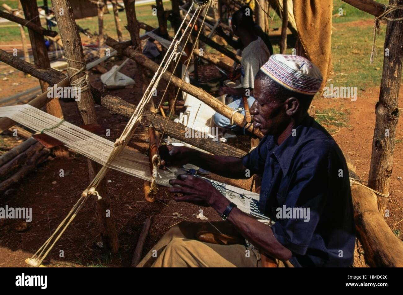 Senufo men weaving on looms, Waraniene, Ivory Coast Stock Photo - Alamy