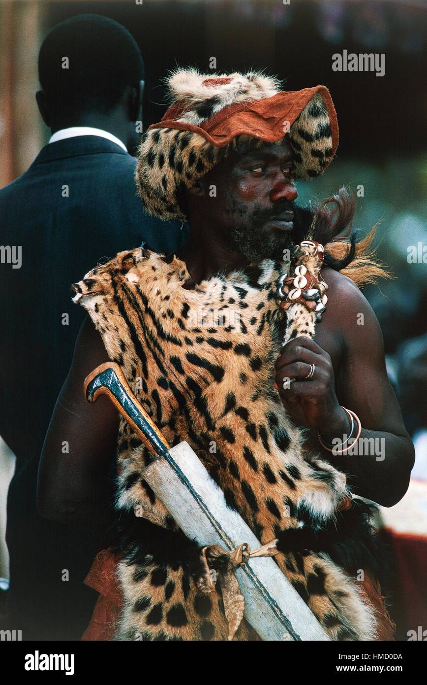 Man dressed in leopard skin during the coronation feast for the Kabaka ...