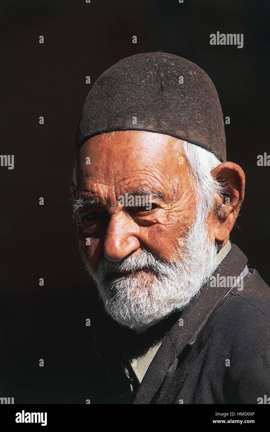 Old man with a beard and hat, Iran Stock Photo - Alamy