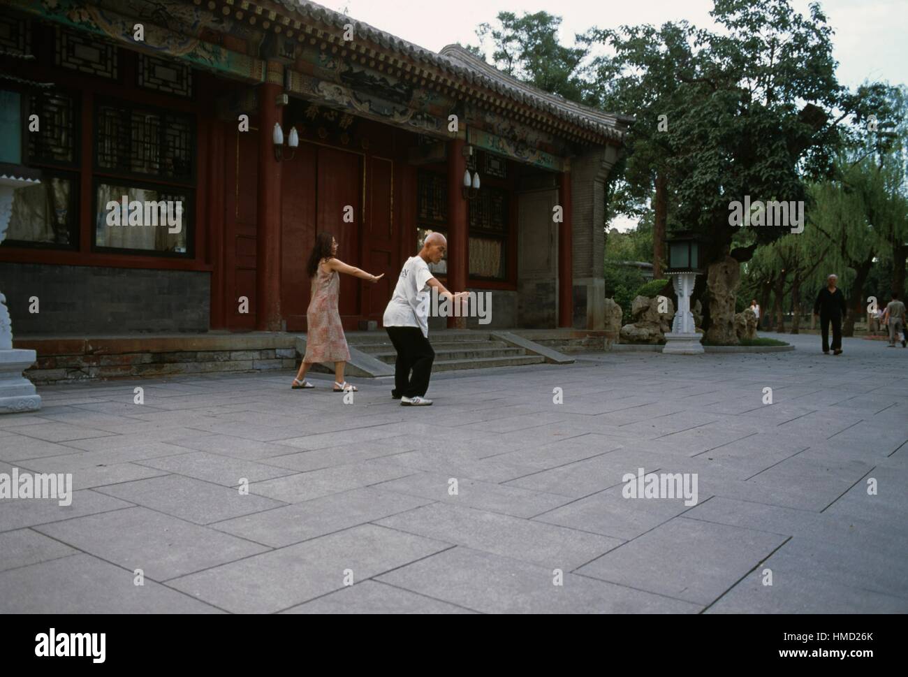 Practitioners of Taijiquan in front of a pavilion in Beihai Park, Beijing, China Stock Photo - Alamy