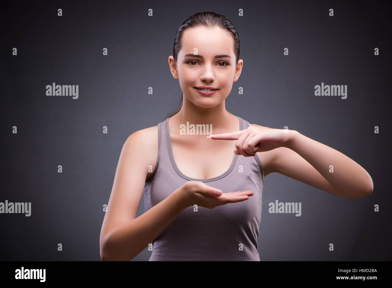 Young sports girl pressing virtual button Stock Photo - Alamy