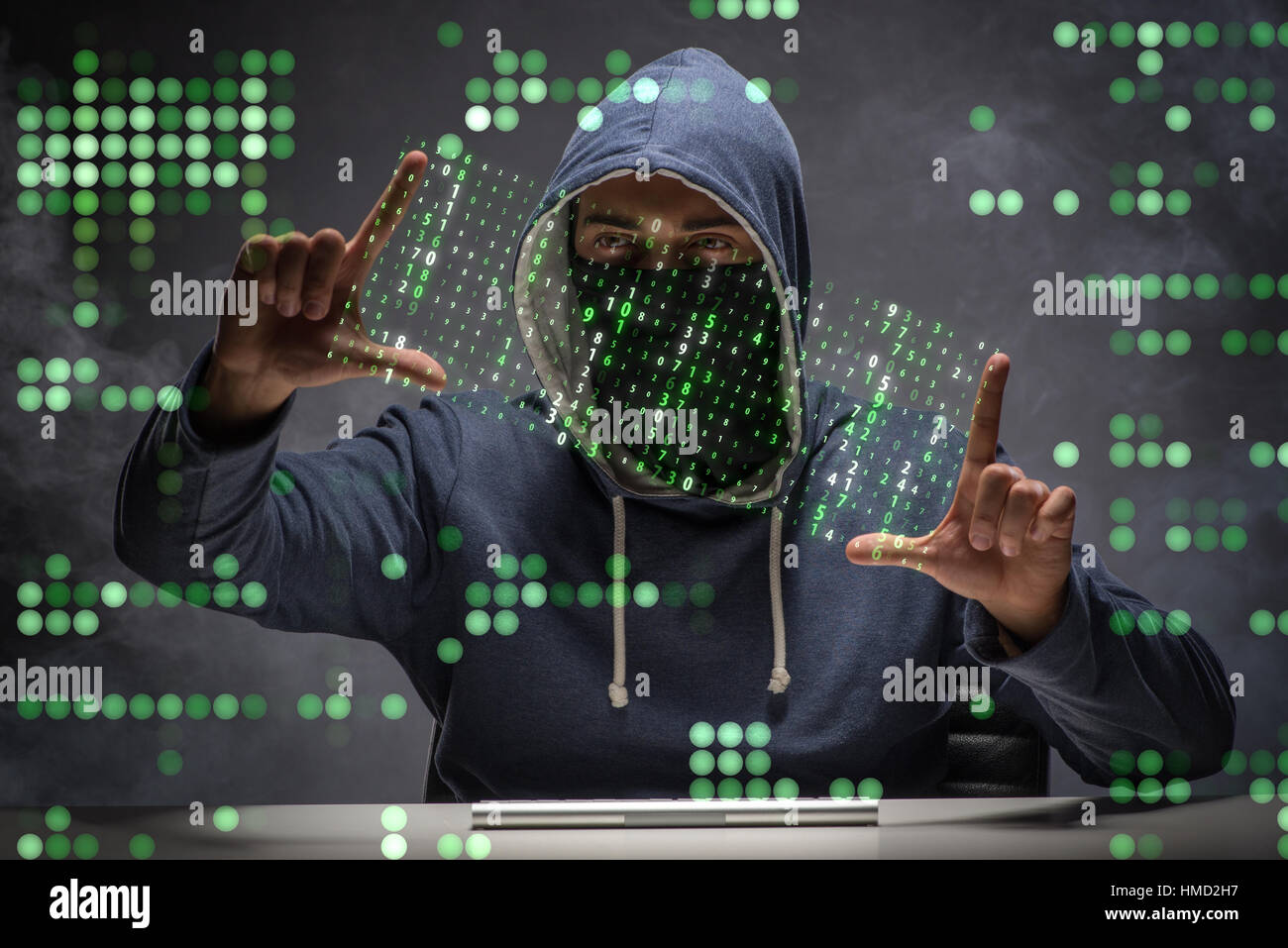 Young hacker in data security concept Stock Photo - Alamy