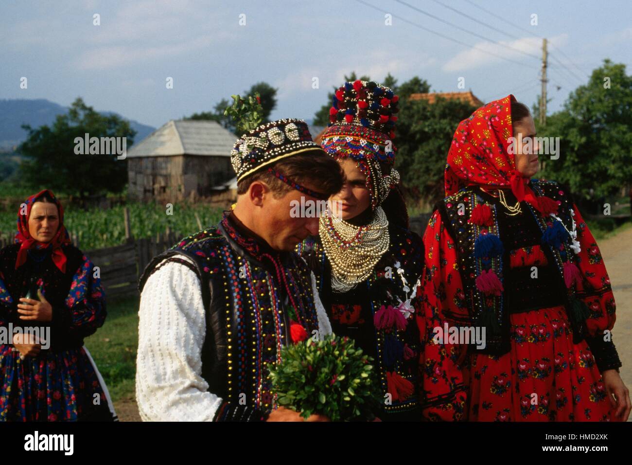 Bride and groom in traditional costumes, wedding celebrations ...