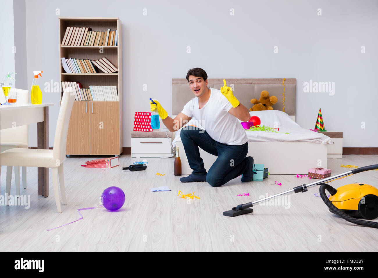 Man at home after heavy partying Stock Photo - Alamy
