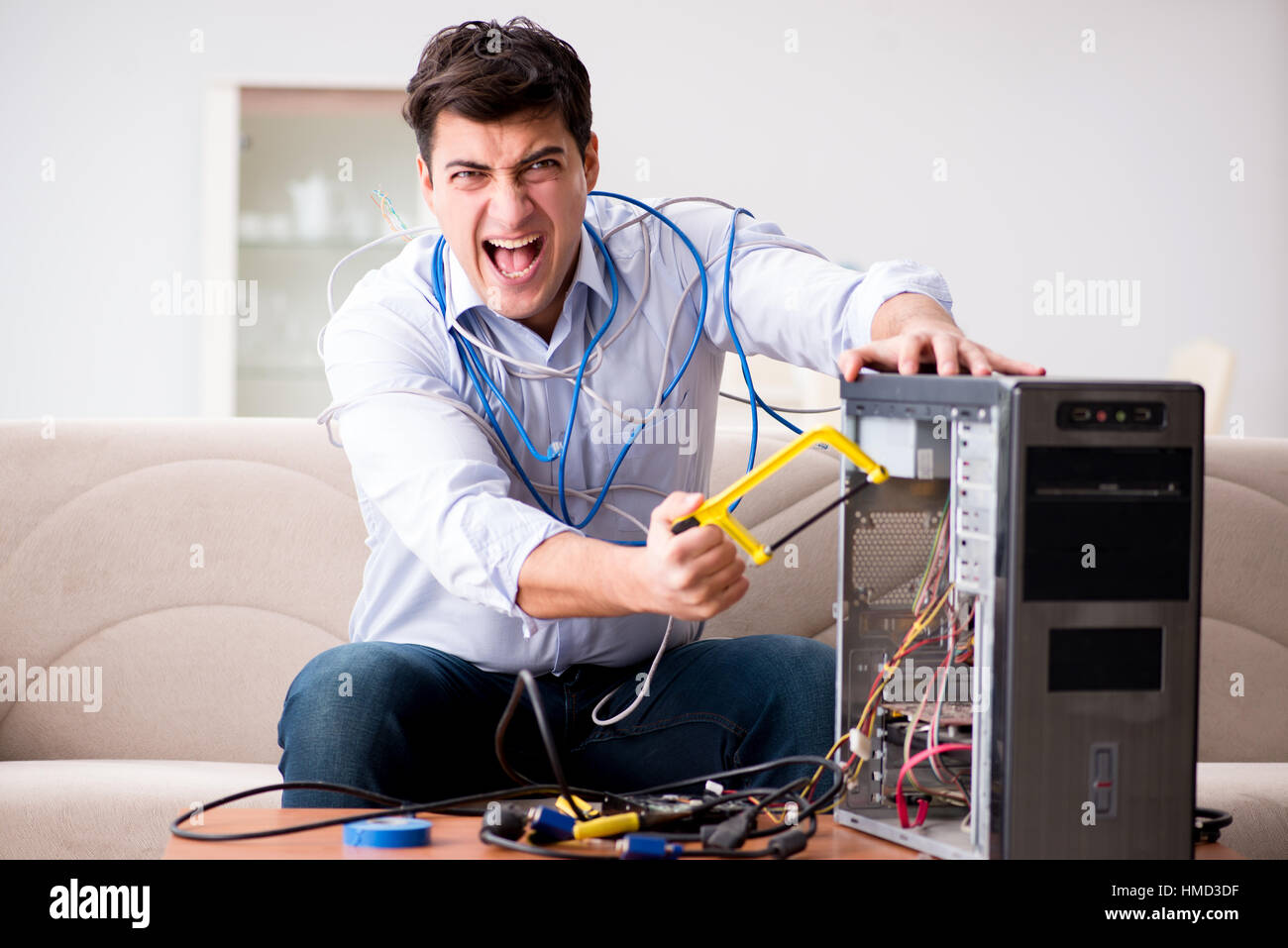Frustrated man with broken pc computer Stock Photo - Alamy