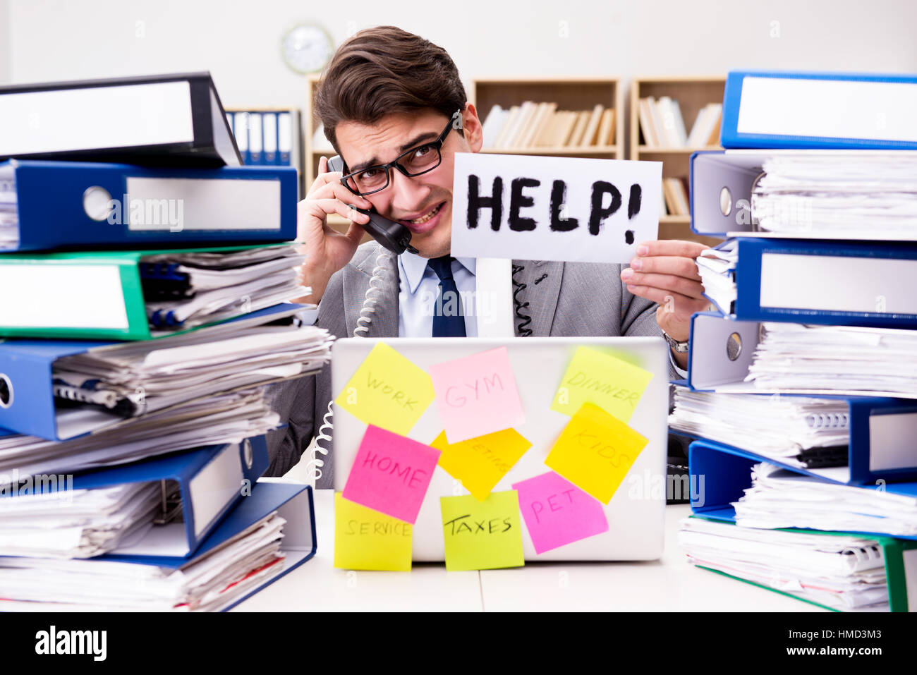 Busy businessman asking for help with work Stock Photo - Alamy