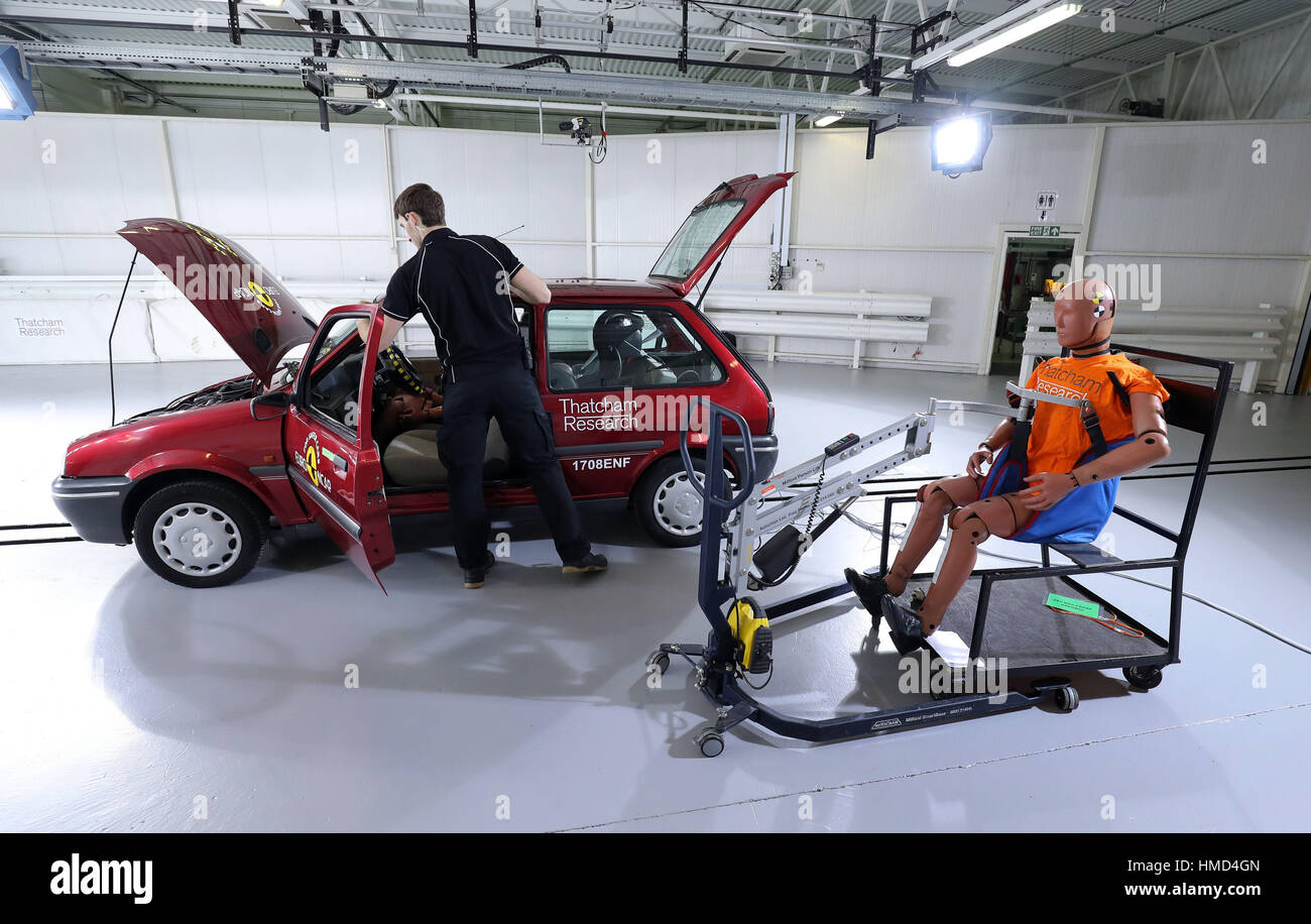 Technicians prepare a 1997 Rover 100 before being crash tested at ...