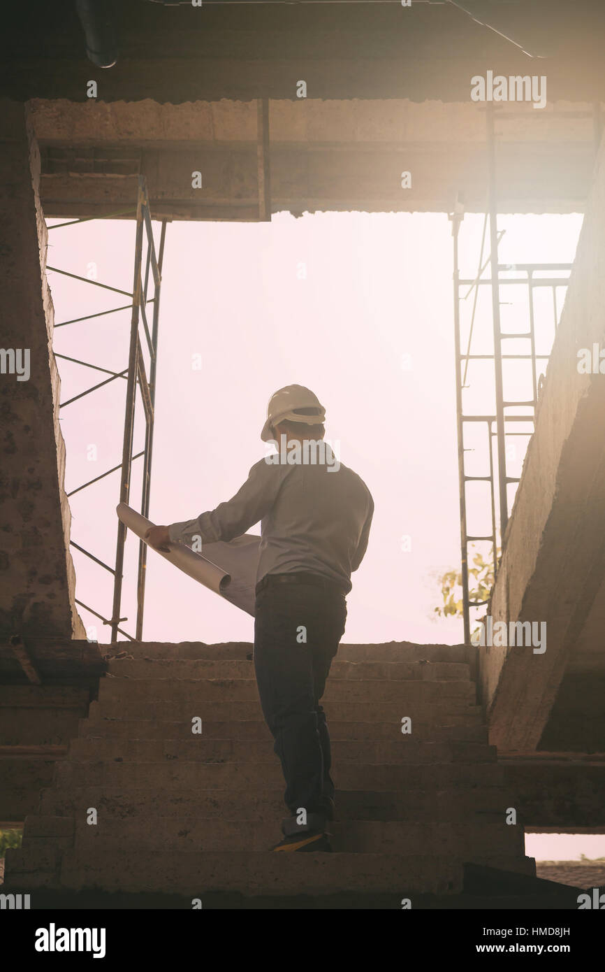 Engineer Architect working at Construction Site, Vintage Effect Stock ...