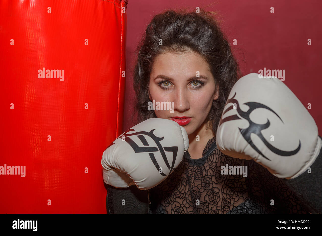 Lovely girl on training in boxing Stock Photo - Alamy