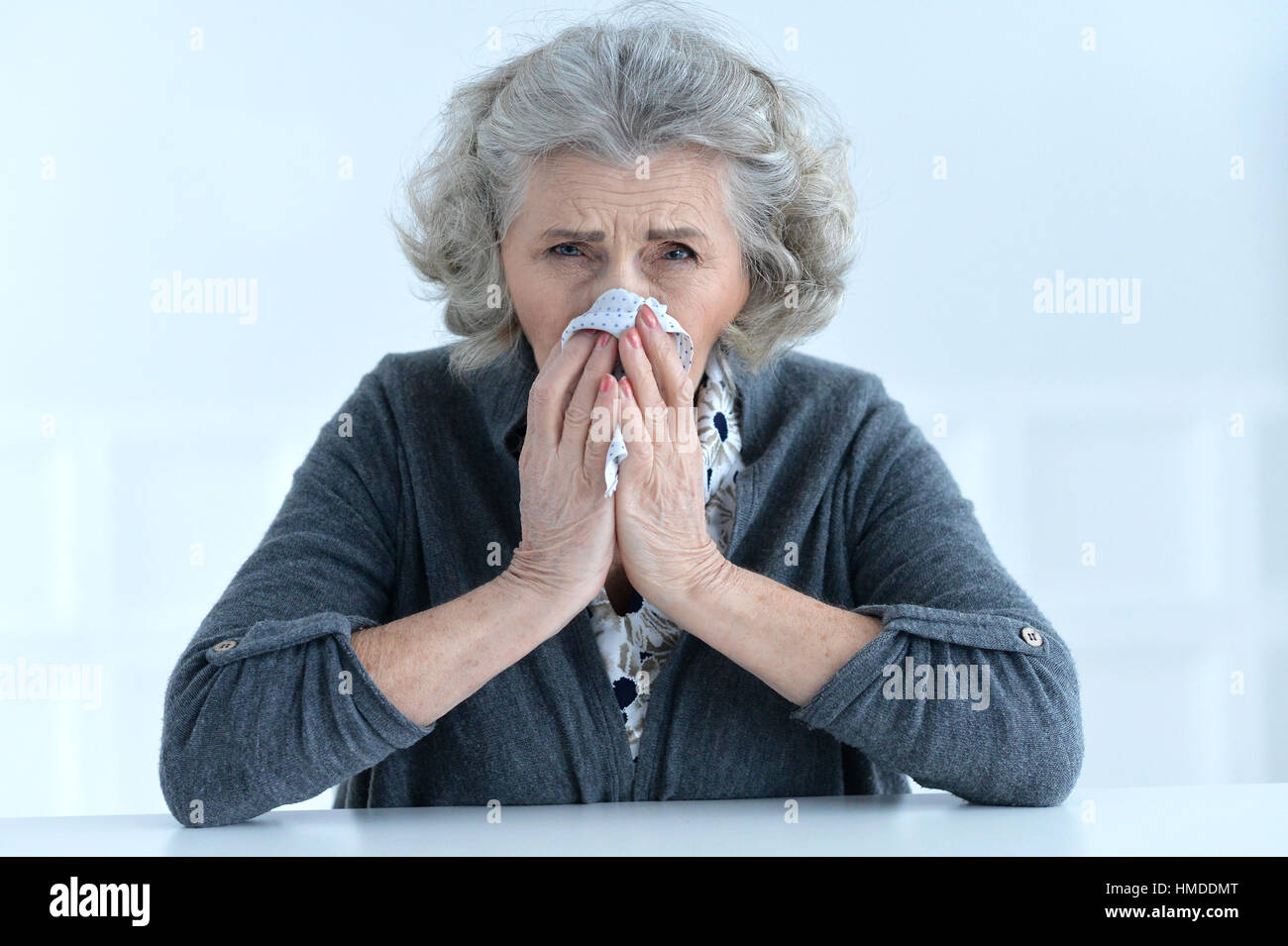 Holding handkerchief hi-res stock photography and images - Alamy