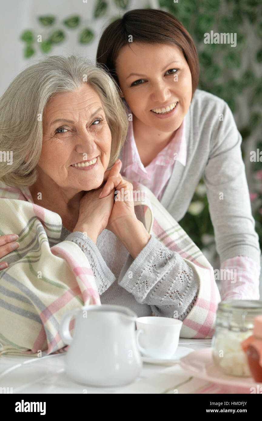 mother and daughter drinking tea Stock Photo - Alamy