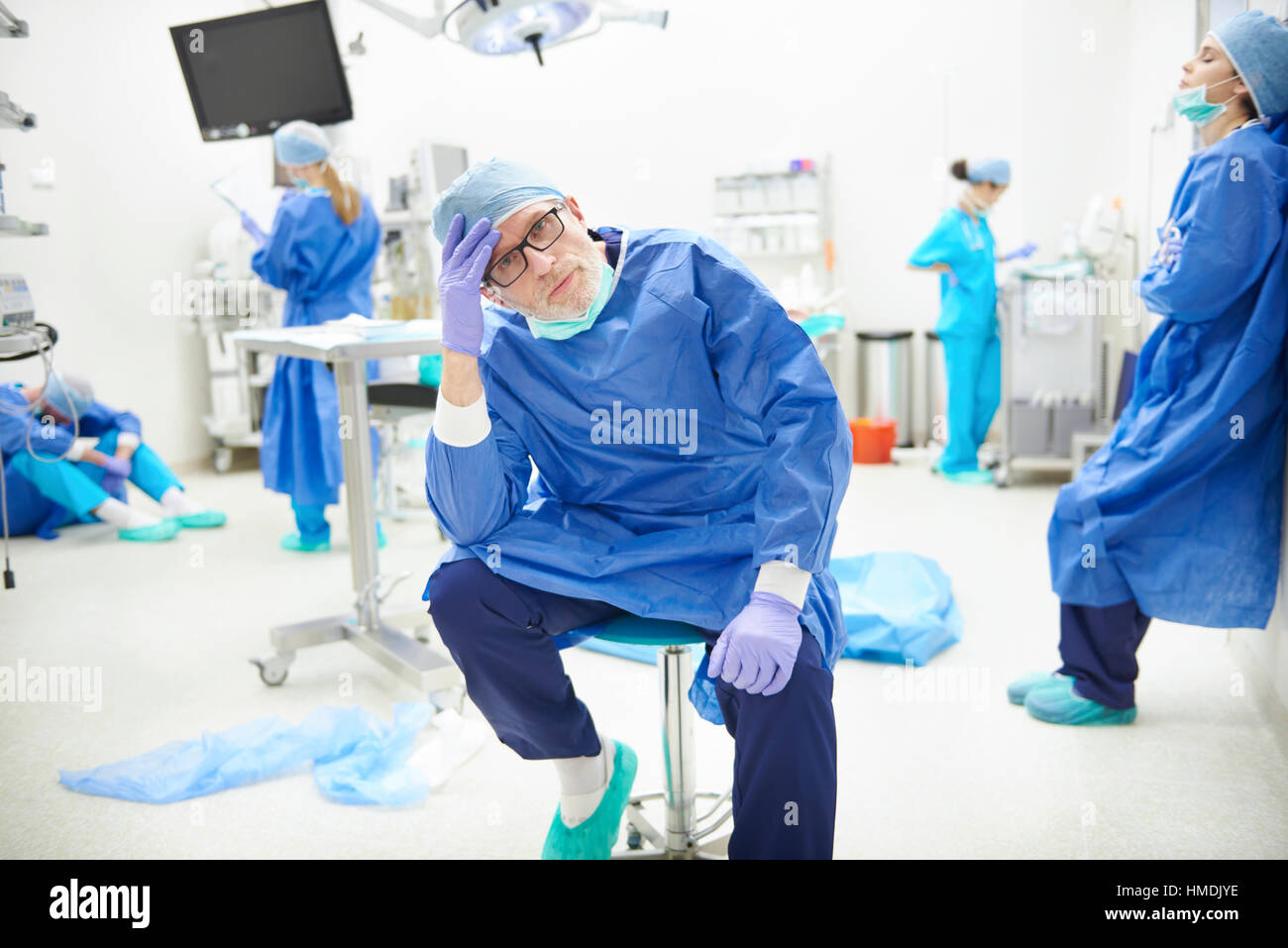 Tired surgeon after the operation Stock Photo - Alamy