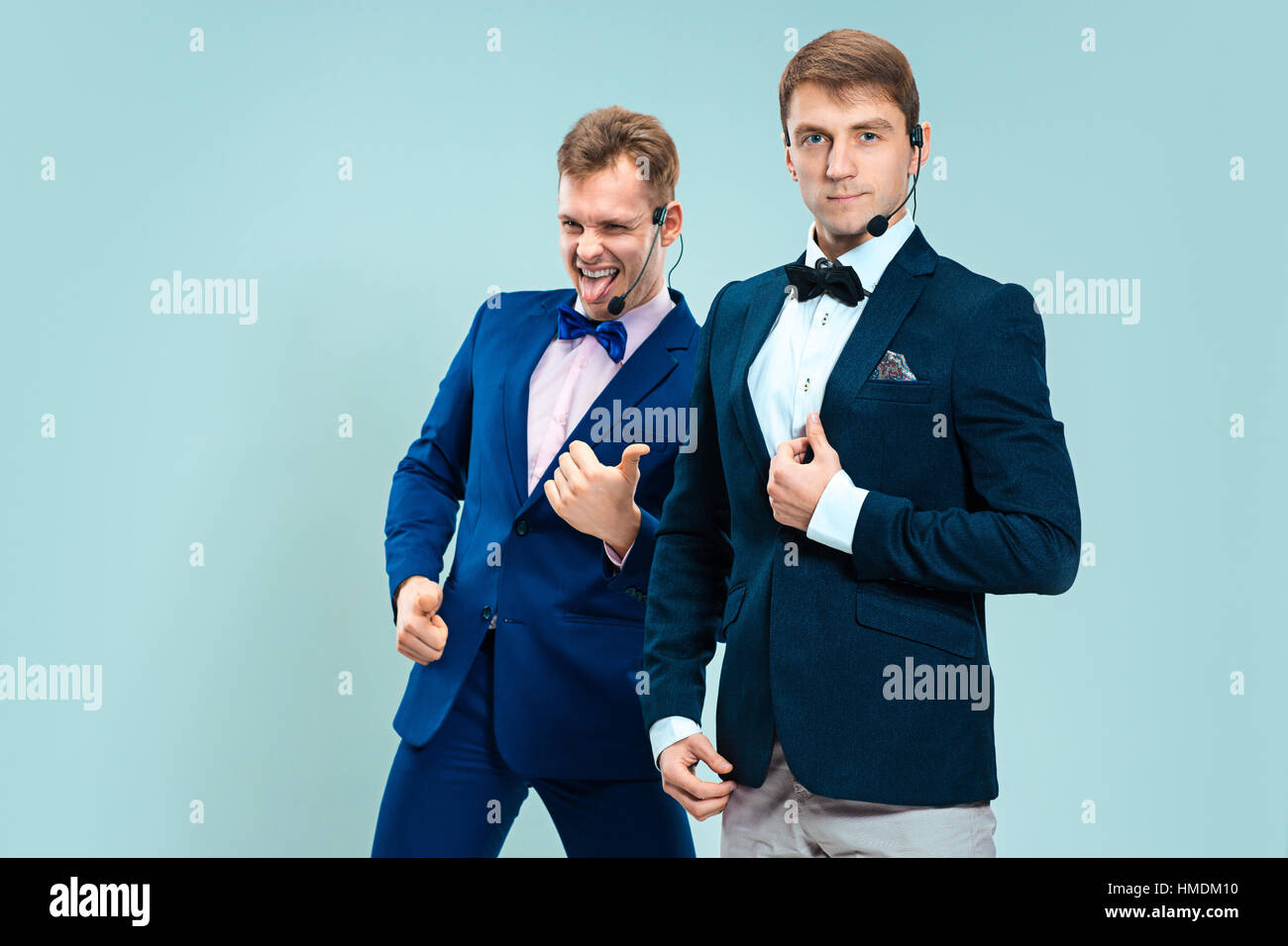 Portrait of a handsome customer service operator wearing a headset ...