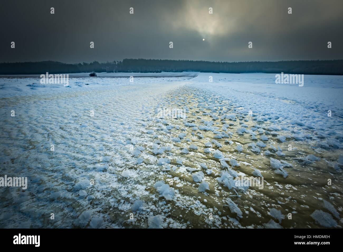 Beautiful winter landscape with ice structure. Frozen water reservoir ...