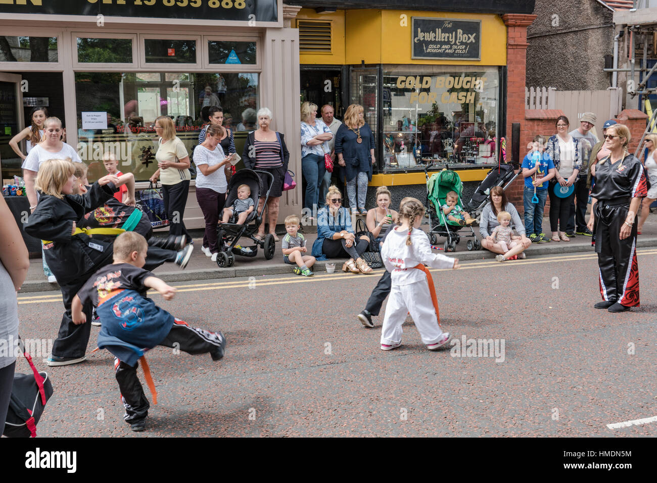 Junior martial arts display in the Prestatyn Carnival parade Stock ...