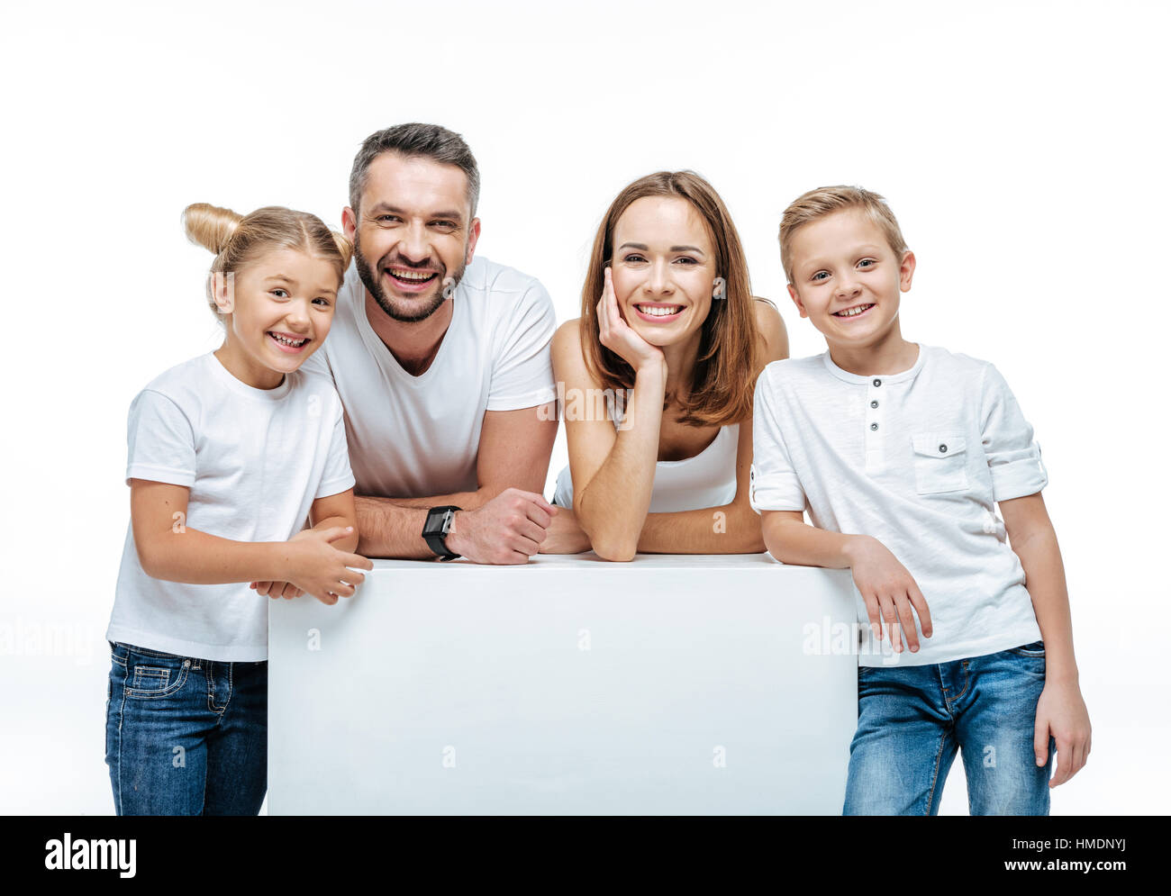 Cheerful family standing together Stock Photo - Alamy
