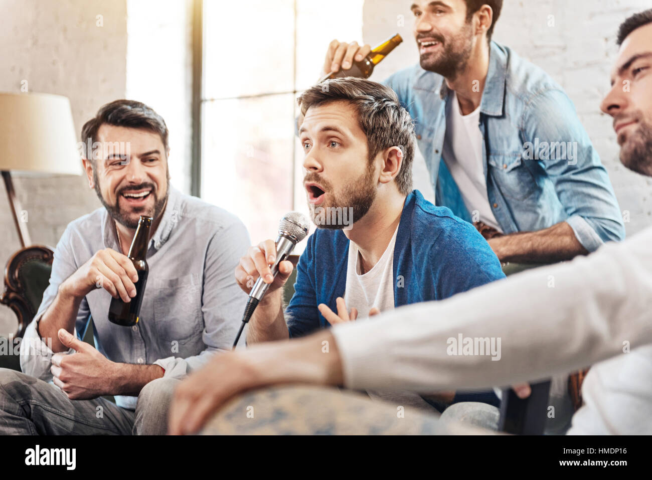 Handsome man singing song hi-res stock photography and images - Alamy